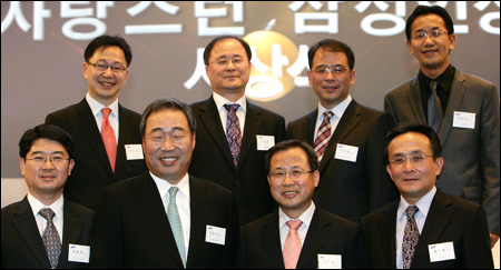Shin Sang-heung, third from left in front row, executive... - The Korea ...