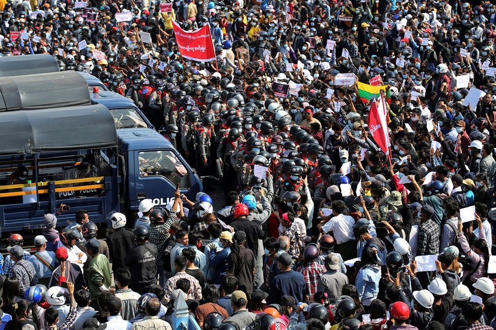 Myanmar junta imposes curfew, meeting bans as protests swell - The ...