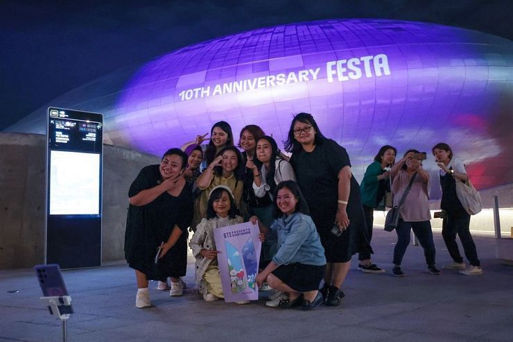 BTS fans flock to purple-lit Seoul for group's 10th anniversary - The ...
