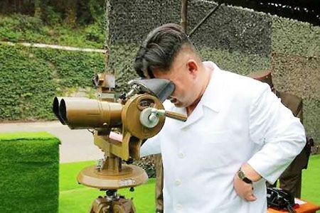 N. Korean leader observes missile launches, calls for stronger nuke ...