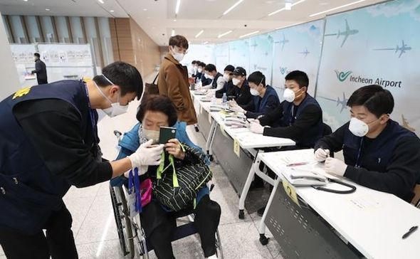Korea to apply strict quarantine screening on arrivals from virus-hit ...